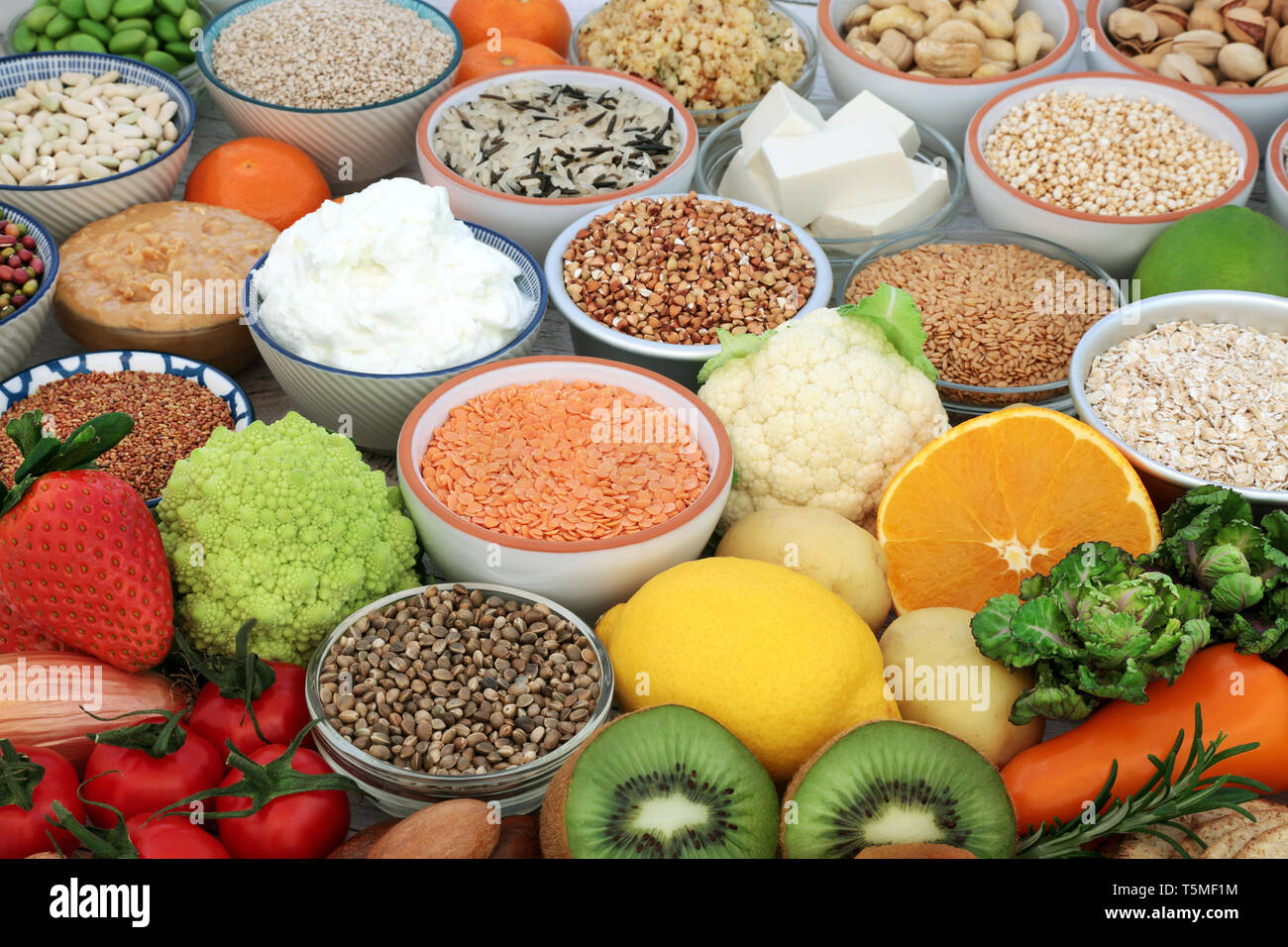 Vegan health food selection with tofu bean curd, fruit, vegetables ...
