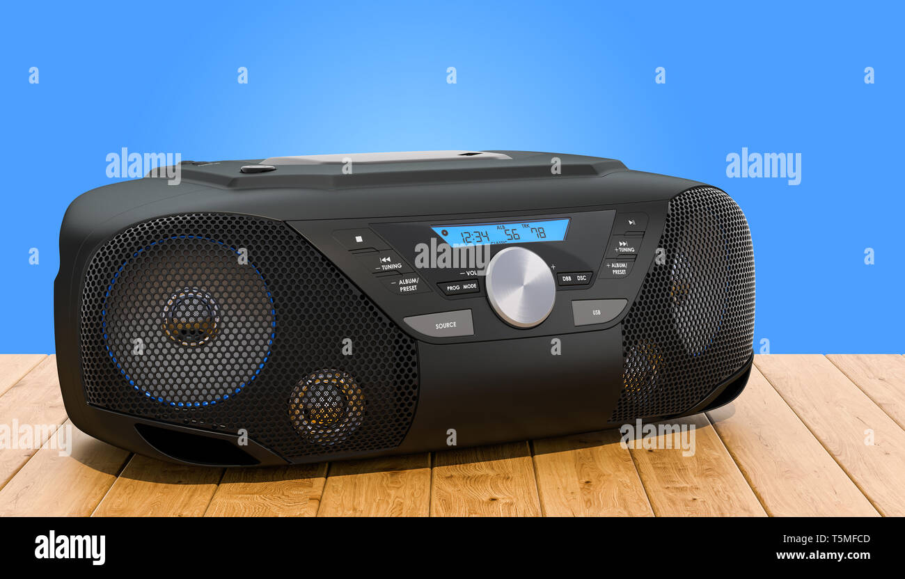 Modern CD Boombox with AM/FM Stereo Radio on the wooden table, 3D ...