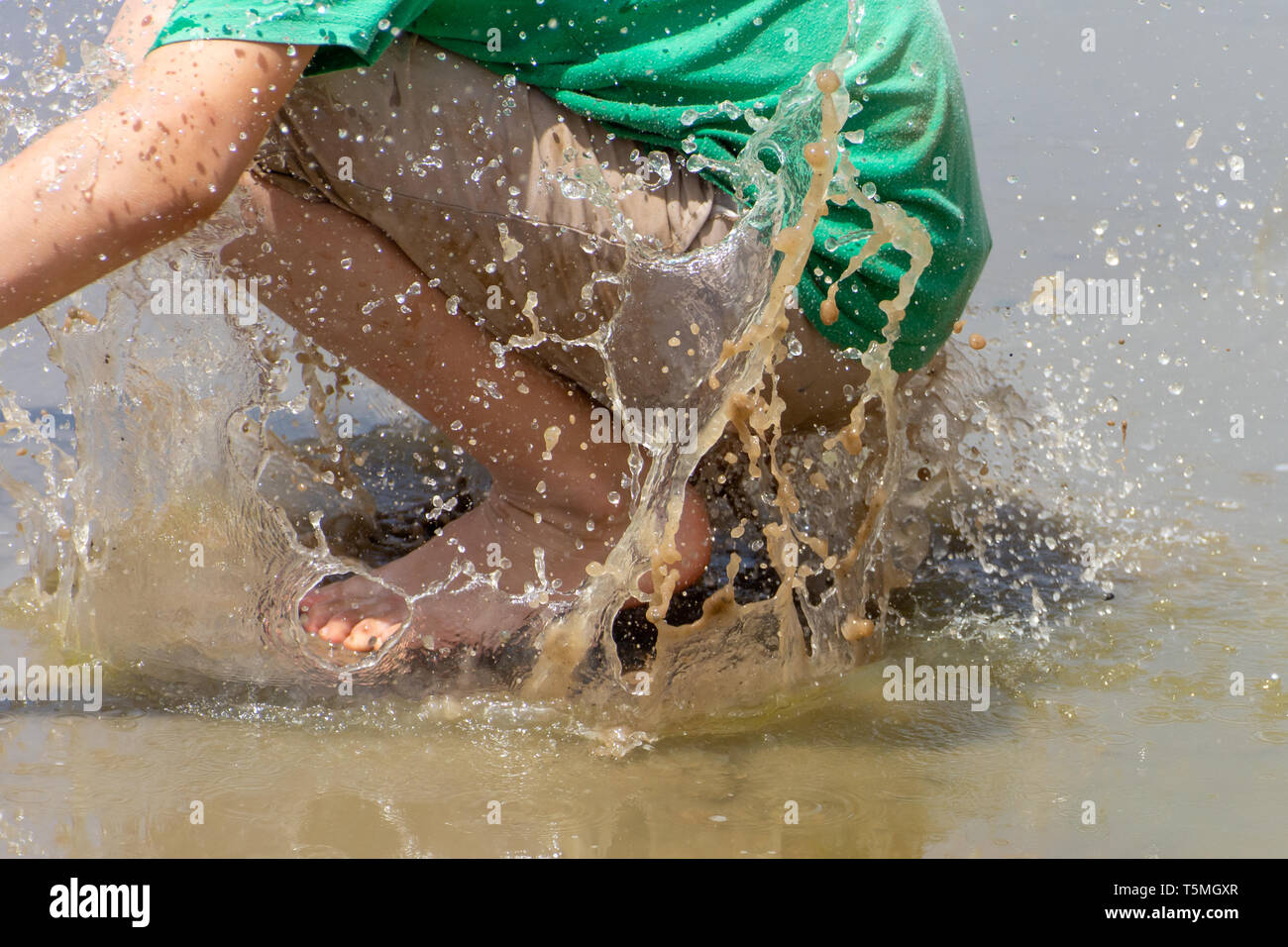 Muddy shoes child hi-res stock photography and images - Alamy