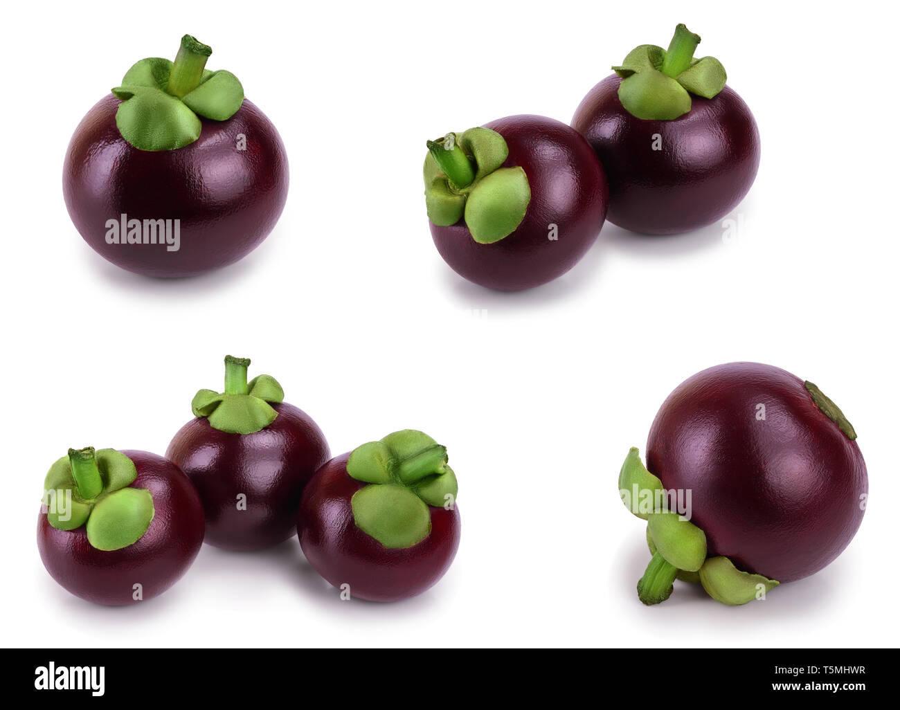 ripe mangosteen with leaves isolated on white background closeup. Set ...