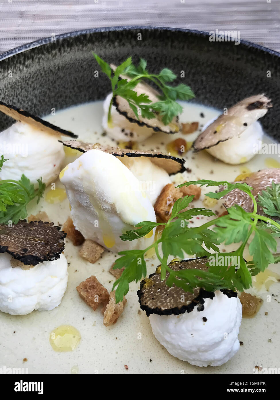Autumn truffles with cream sauce Stock Photo - Alamy