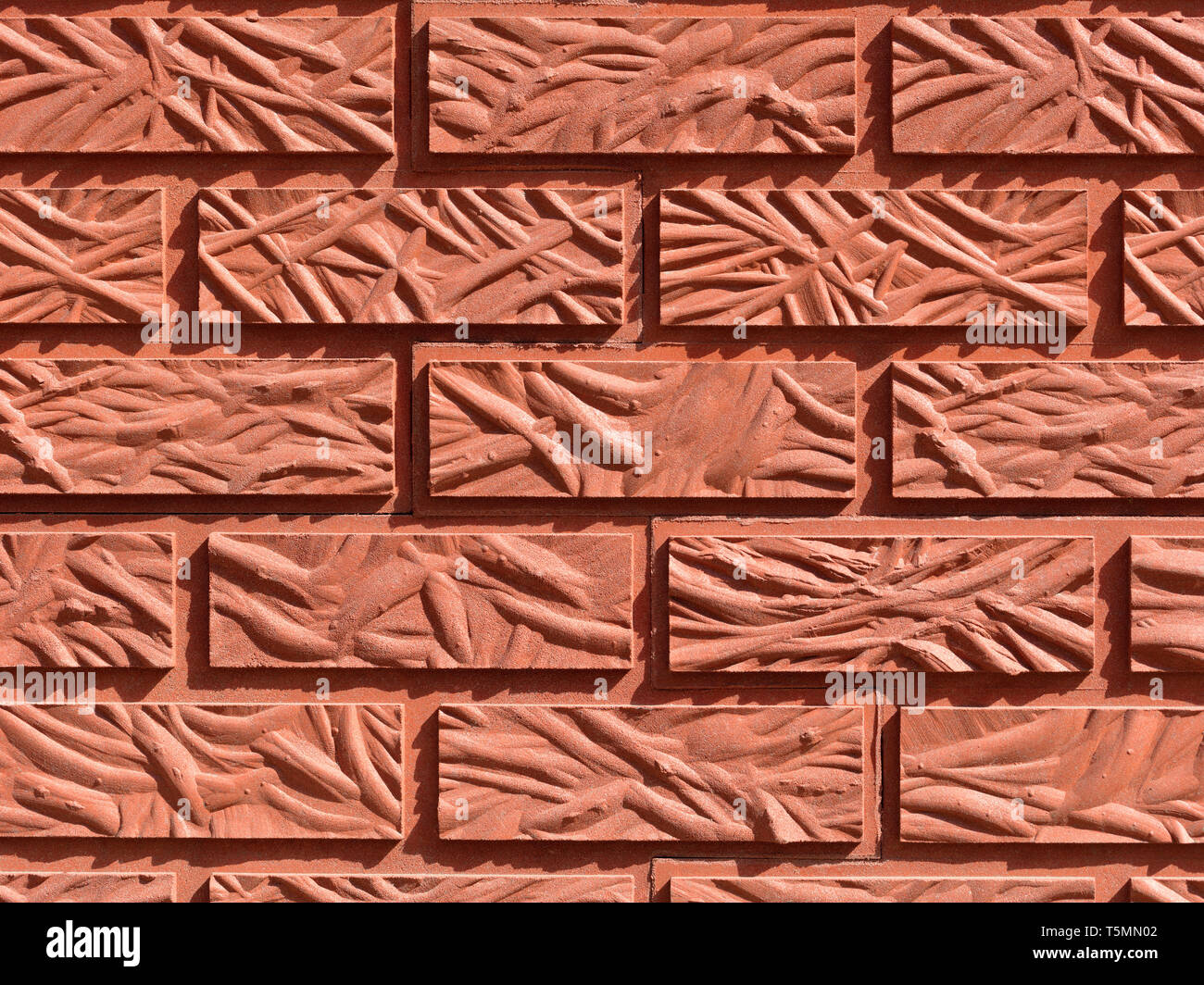 Orange-red brick wall background close-up made of original figured ...