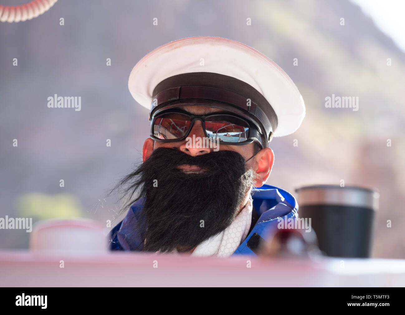 Boat captain wearing fake beard, Espiritu Santo Island, Baja California ...