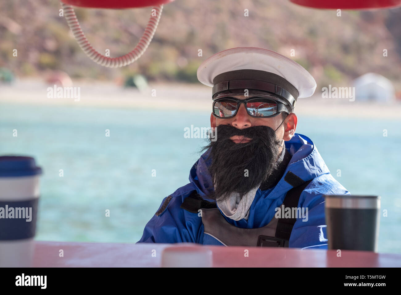Boat captain wearing fake beard, Espiritu Santo Island, Baja California ...