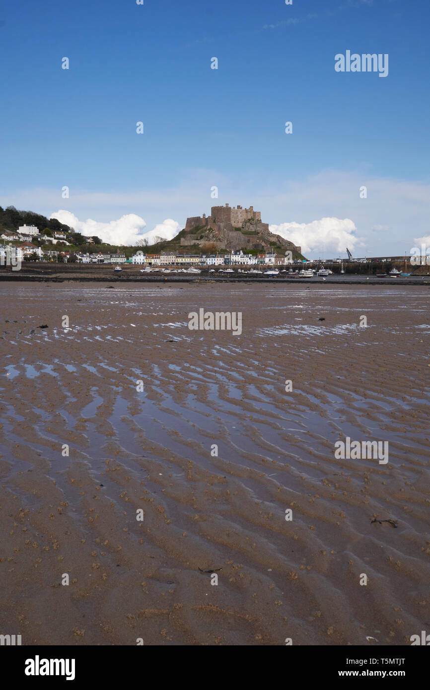 Mont Orgueil castle, also known as Gorey Castle, with the beach and ...