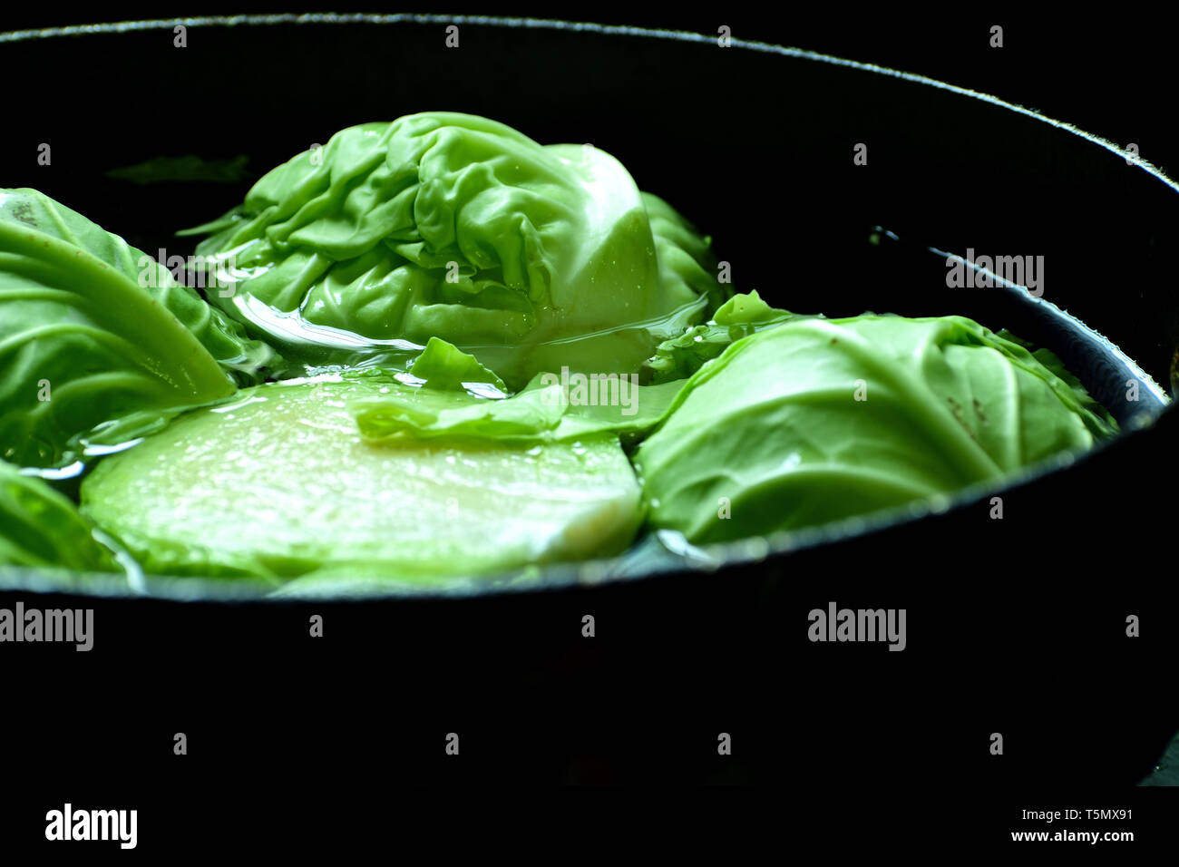 Cut green cabbage hi-res stock photography and images - Alamy