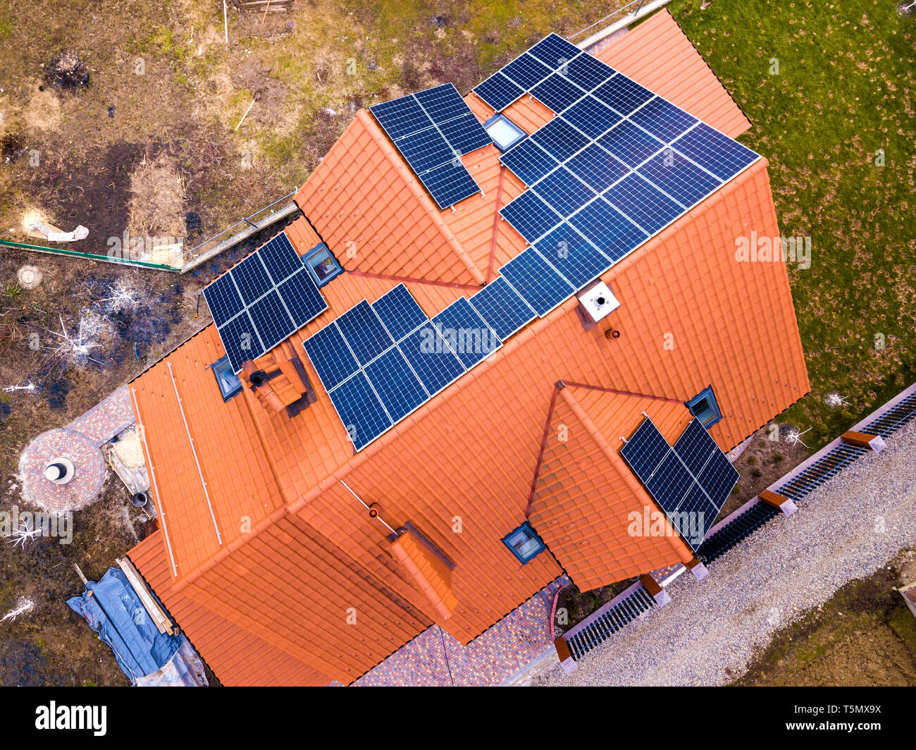 Aerial top view of new modern residential house cottage with blue shiny ...