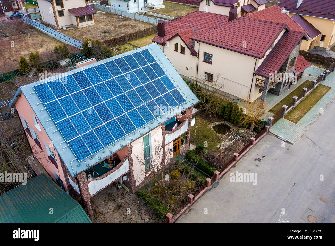 Close-up surface of lit by sun blue shiny solar photo voltaic panels ...