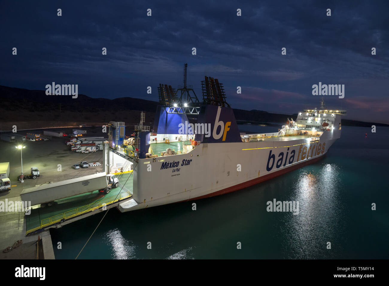 Driving trucks onto a Baja ferry in Pichilingue, Baja California Sur ...