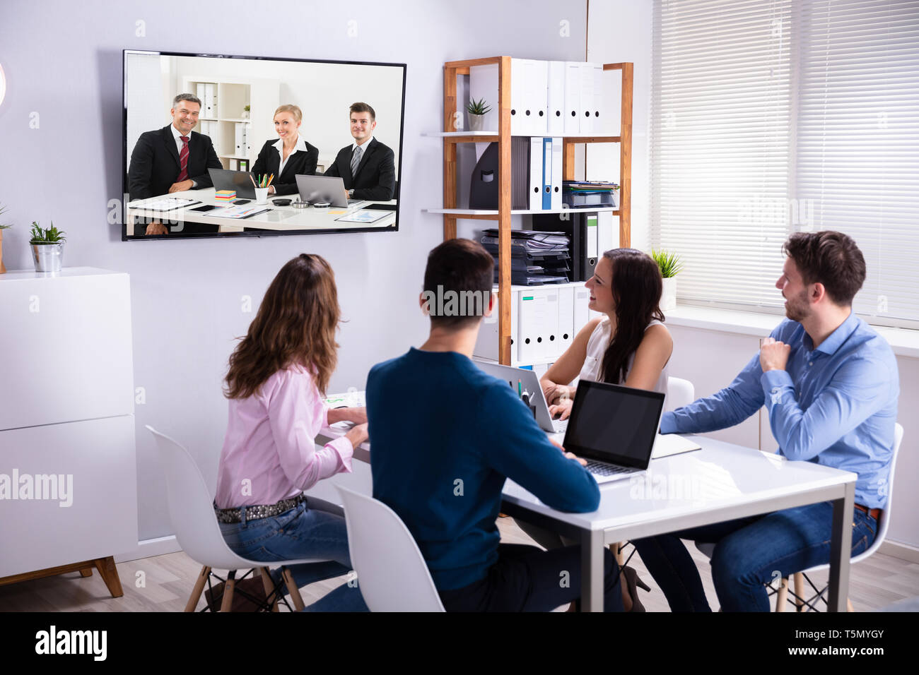 Woman attending meeting hi-res stock photography and images - Alamy