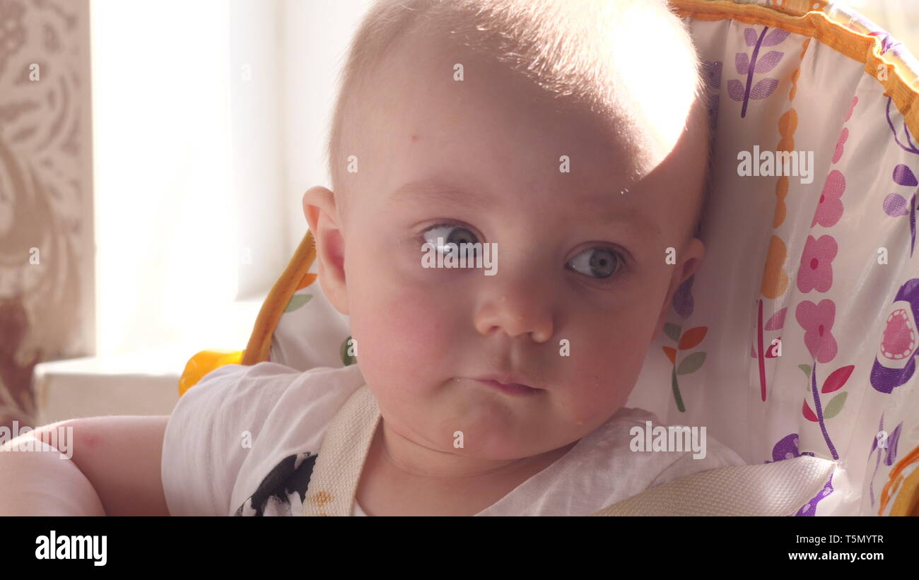 Family kids sitting around table hi-res stock photography and images ...