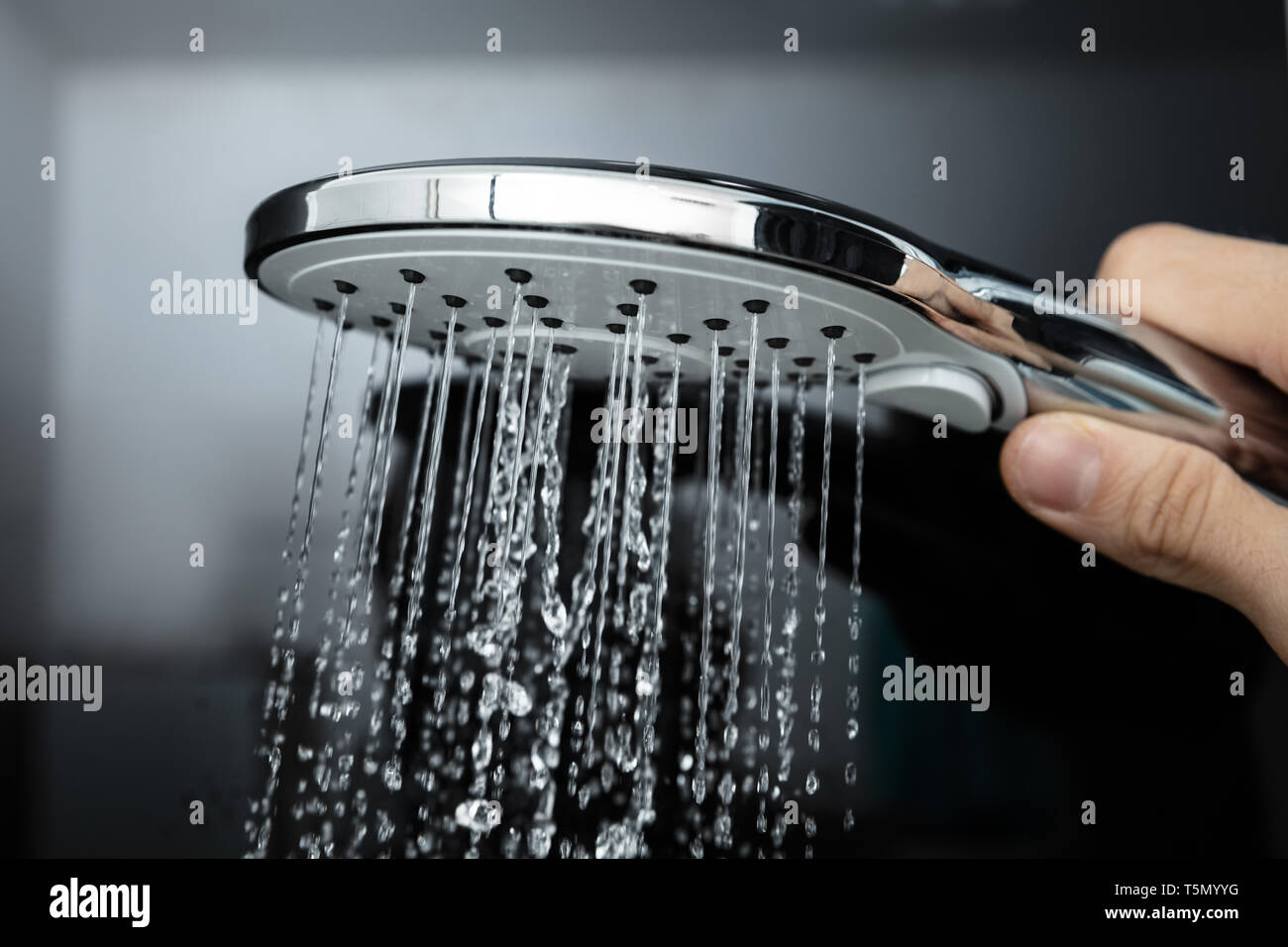 Hand holding water splash hi-res stock photography and images - Alamy