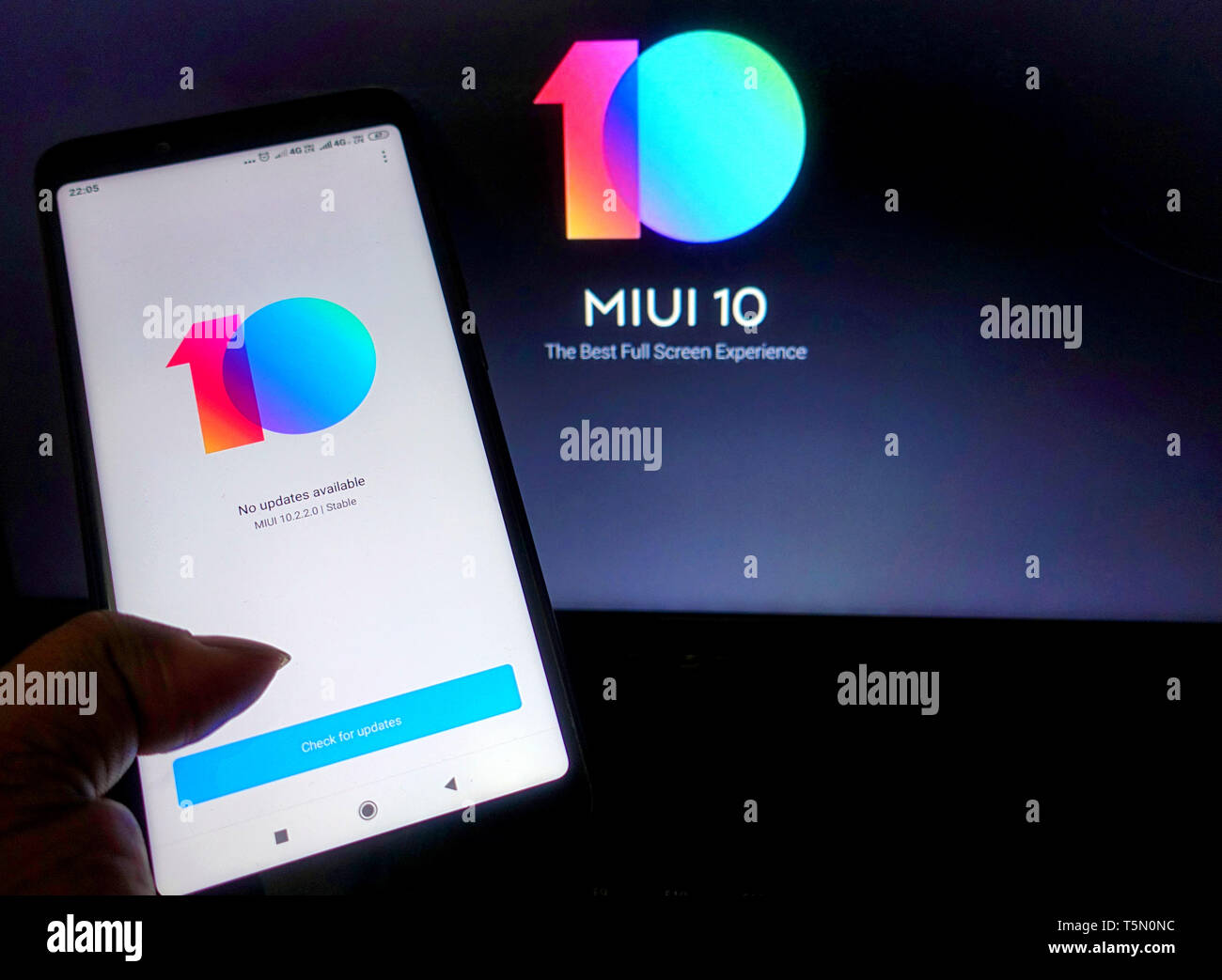In this photo illustration a MIUI10 logo seen displayed in an android smartphone Stock Photo - Alamy