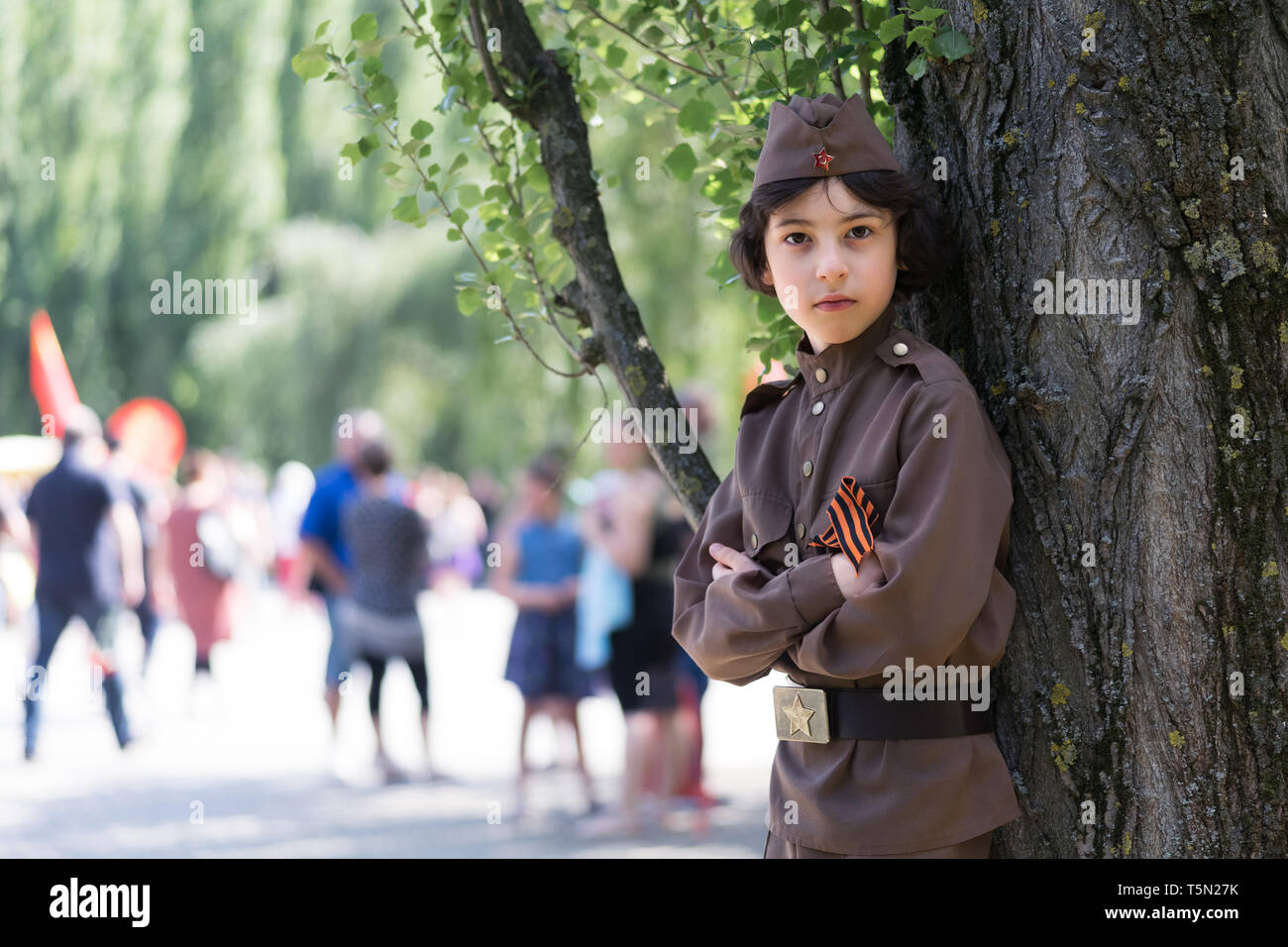 Portrait of a boy in the uniform of a soldier of the Red Army during ...
