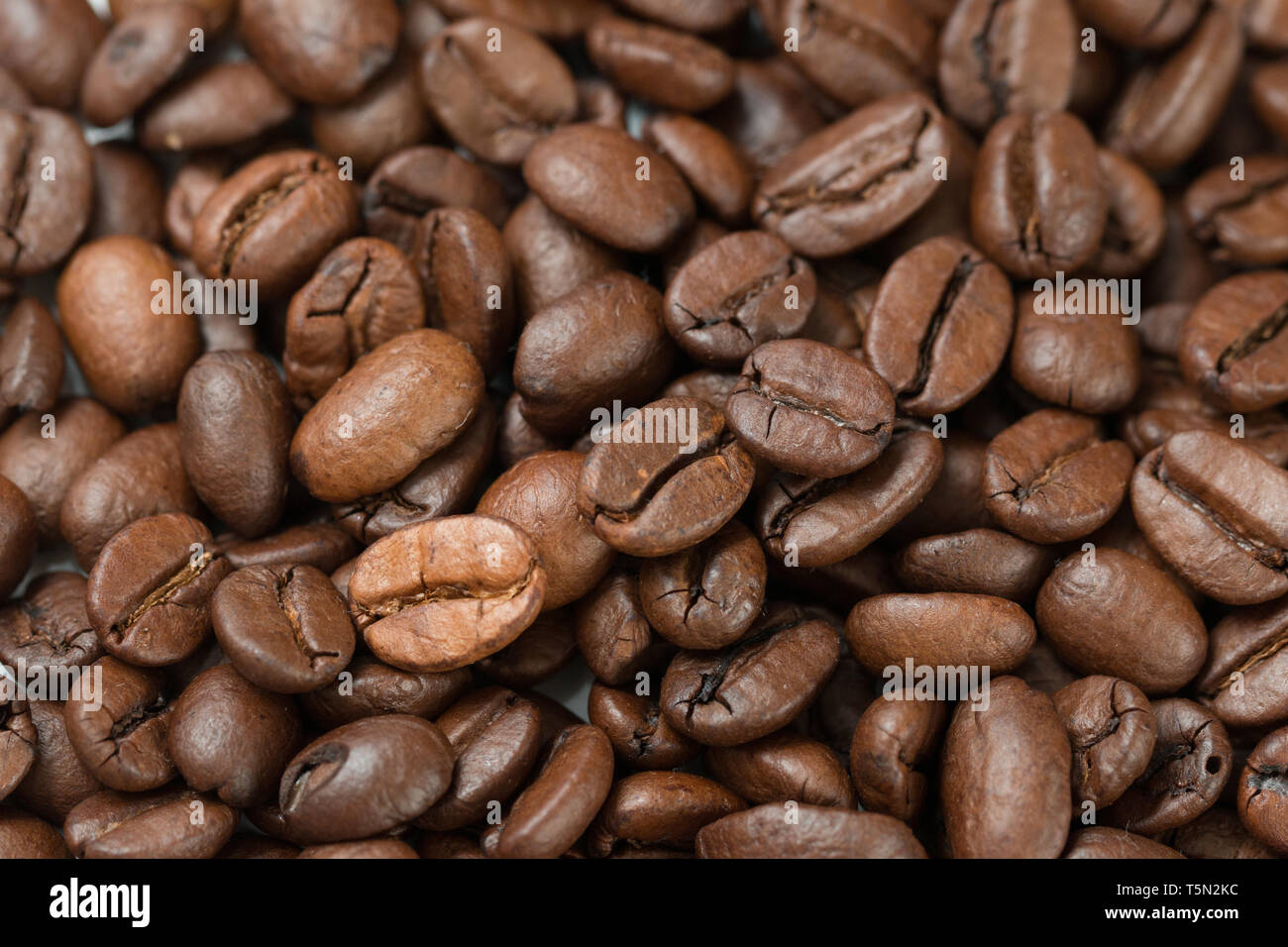 Close up of Spilled Coffee Beans, Texture, wallpaper Stock Photo - Alamy