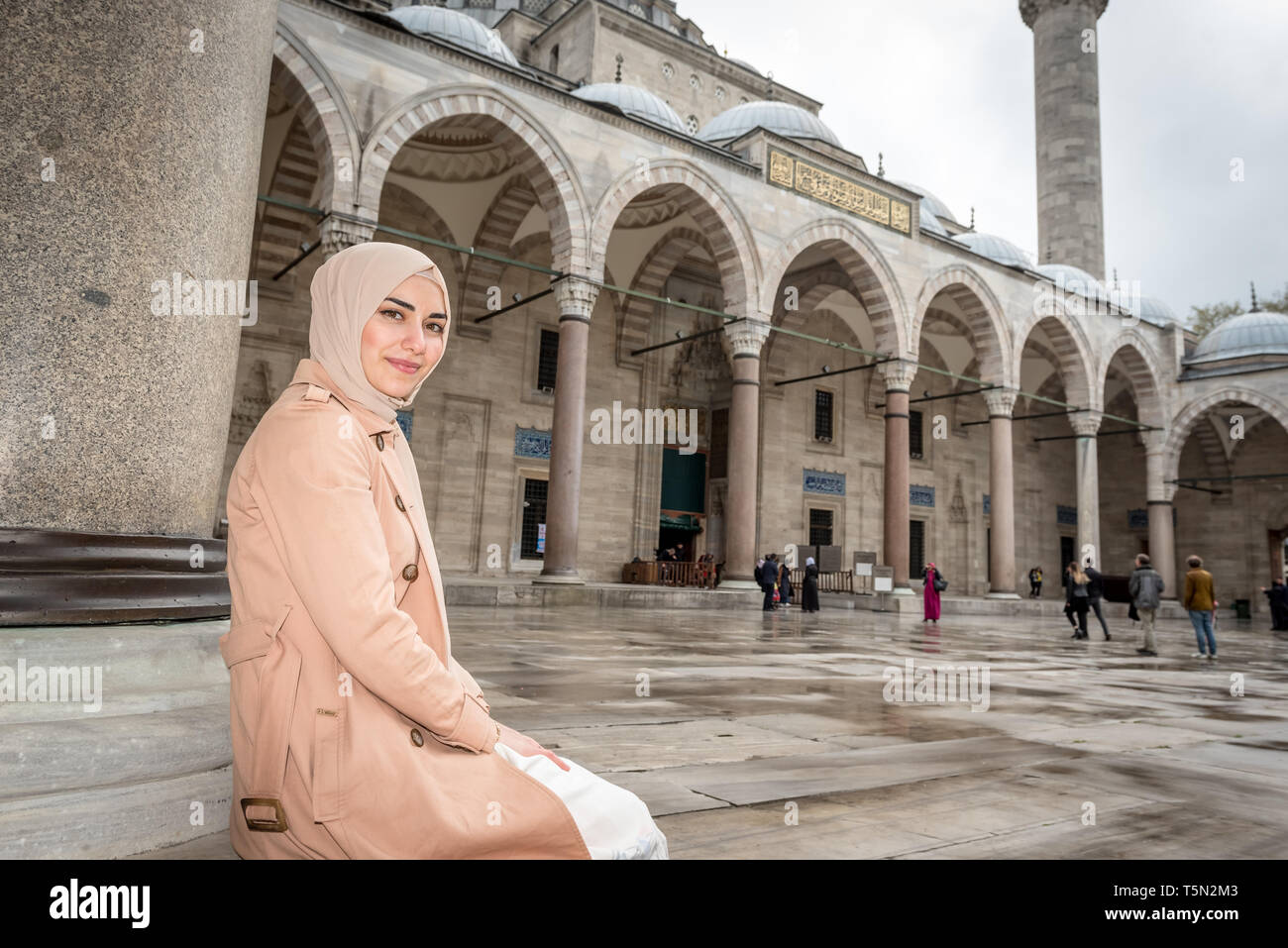 Beautiful Muslim woman in headscarf and fashionable modern trendy ...