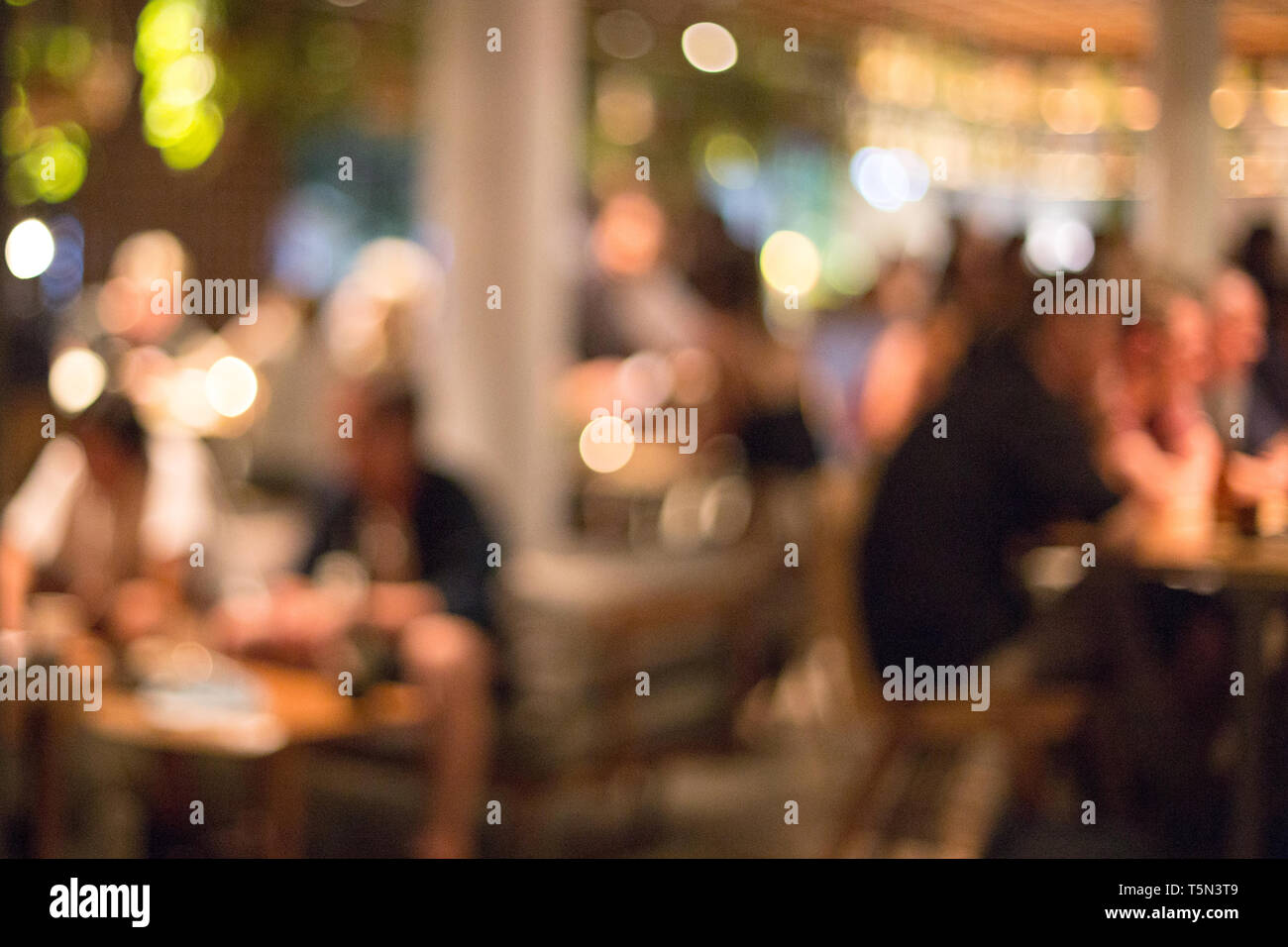 Blurred background of many people had fun at a beach party. Festive ...