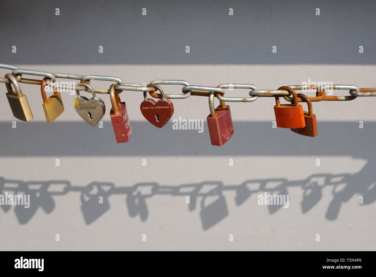 Locks on a chain hi-res stock photography and images - Alamy