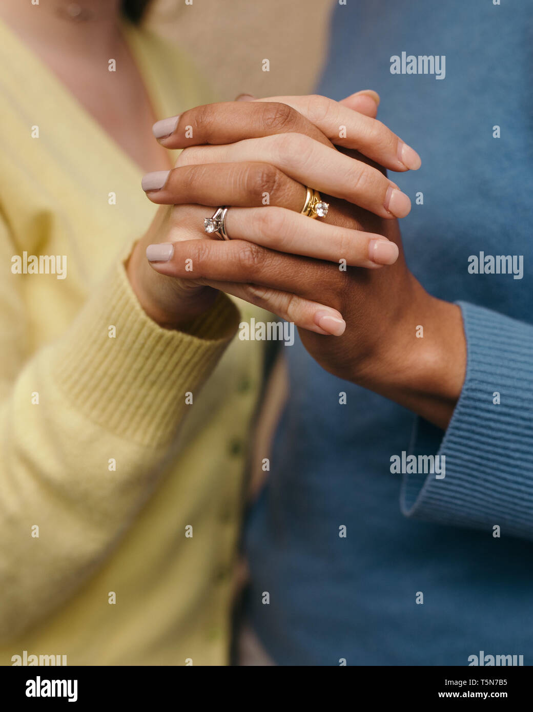 Fingers interlaced hi-res stock photography and images - Alamy
