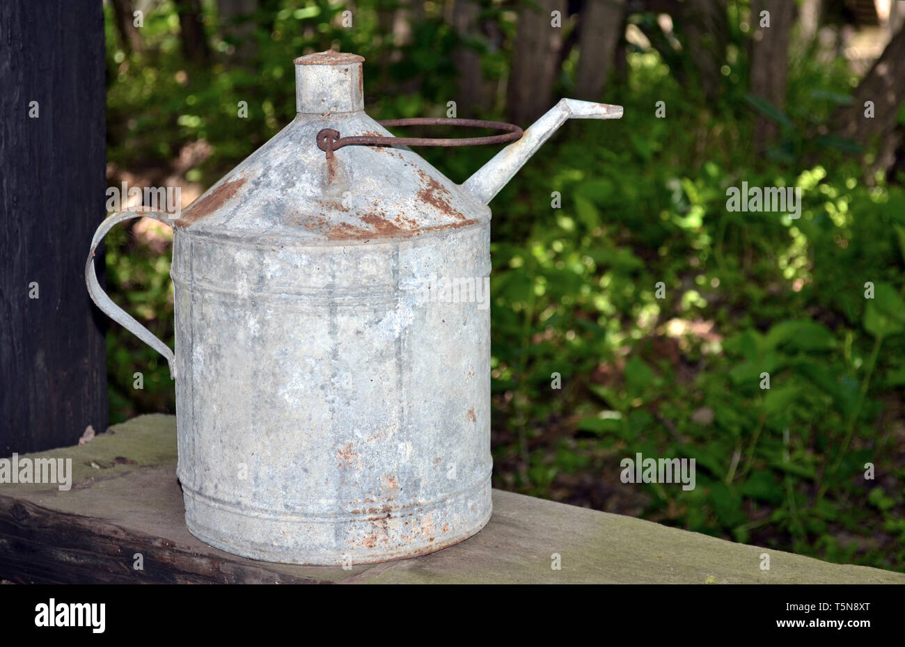 Ancient metal canister used for storing drinks Stock Photo - Alamy