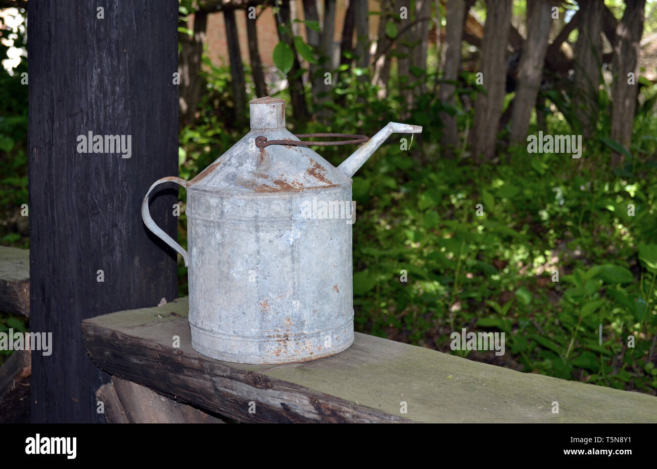 Ancient metal canister used for storing drinks Stock Photo - Alamy