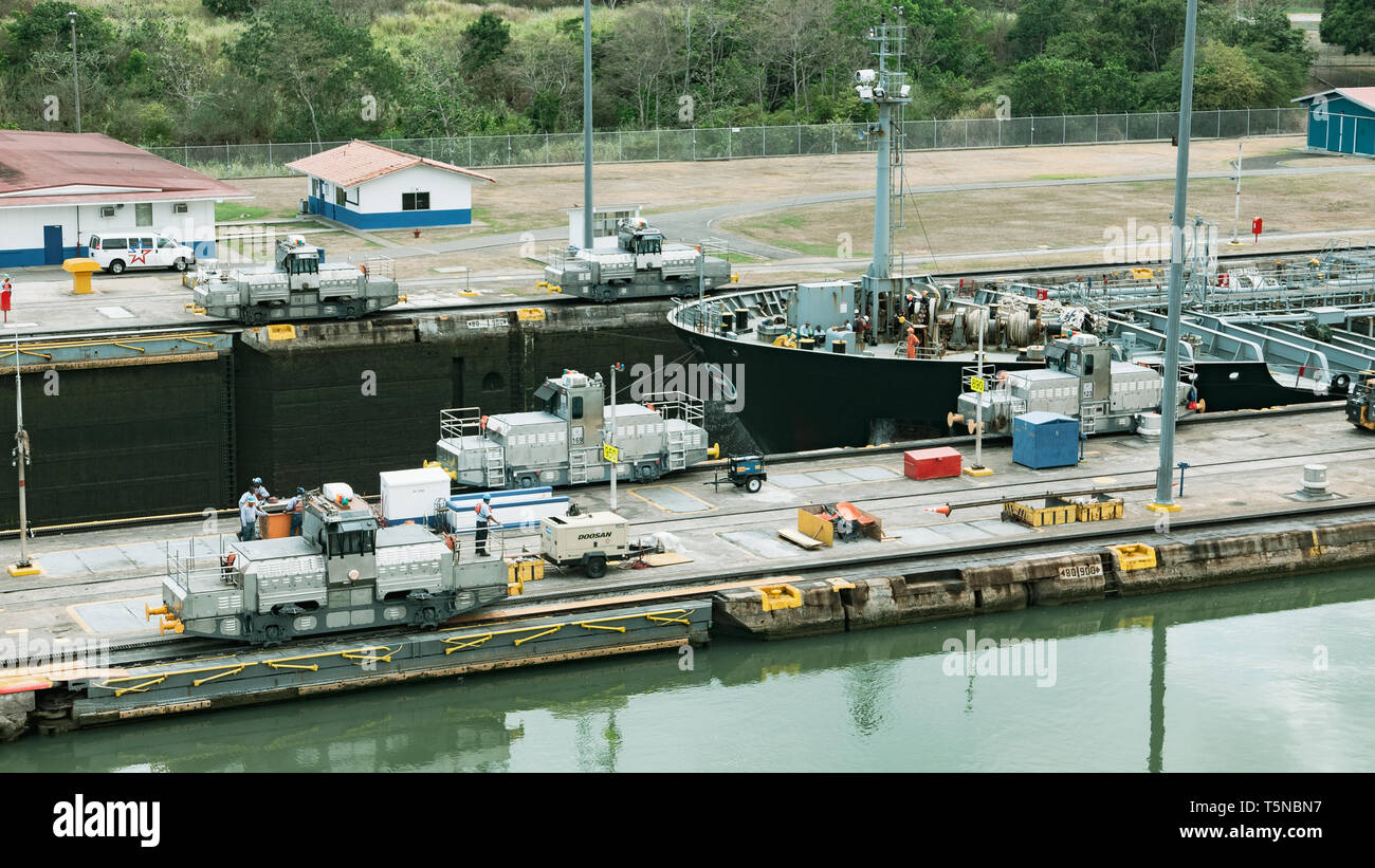 Electric locomotives, known as "mules", guide ships through the ...
