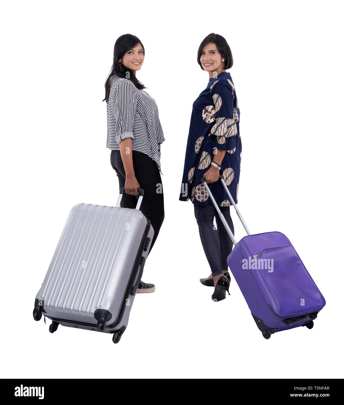 mother and daughter with suitcase walk Stock Photo - Alamy