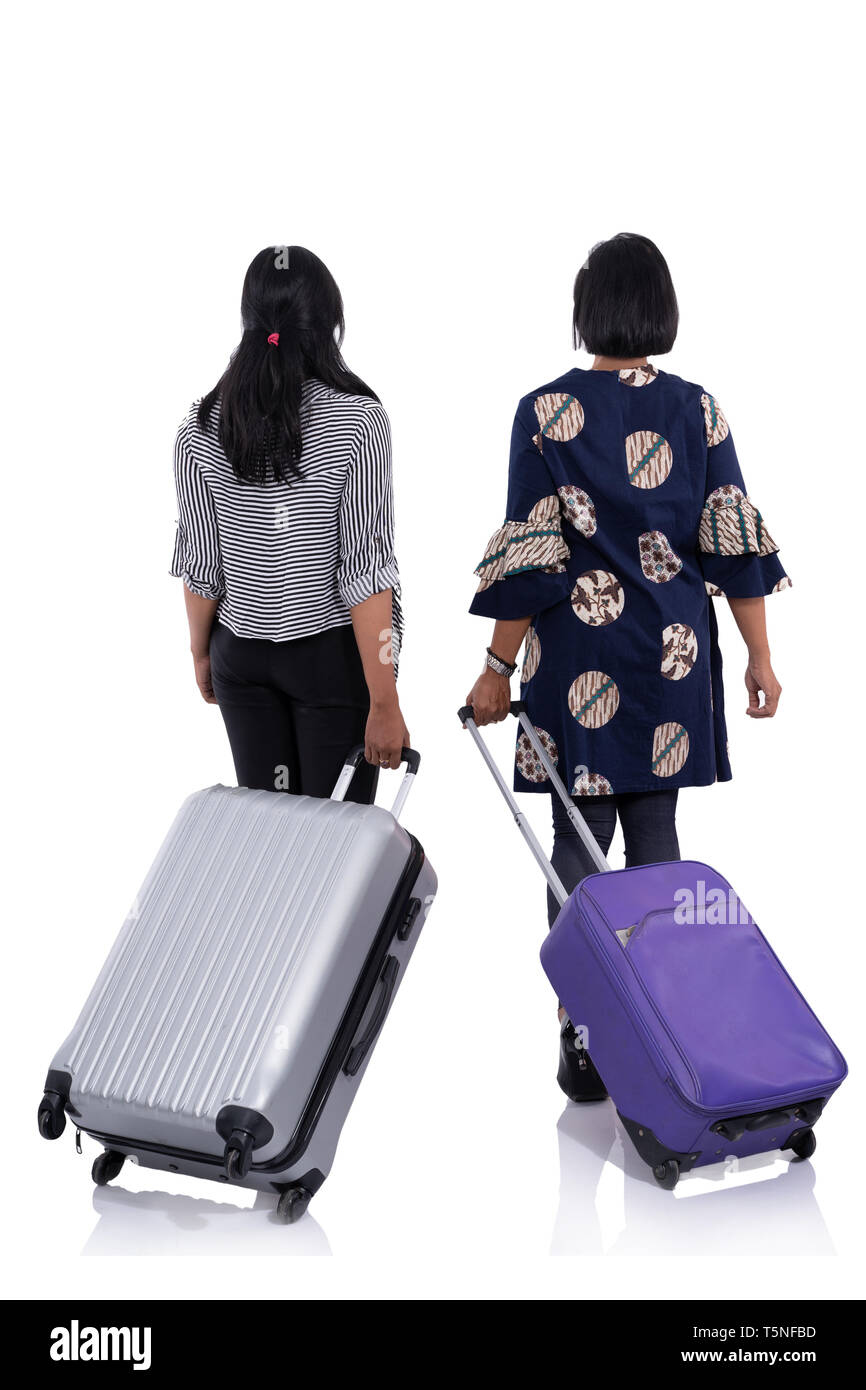 mother and daughter with suitcase walk Stock Photo - Alamy