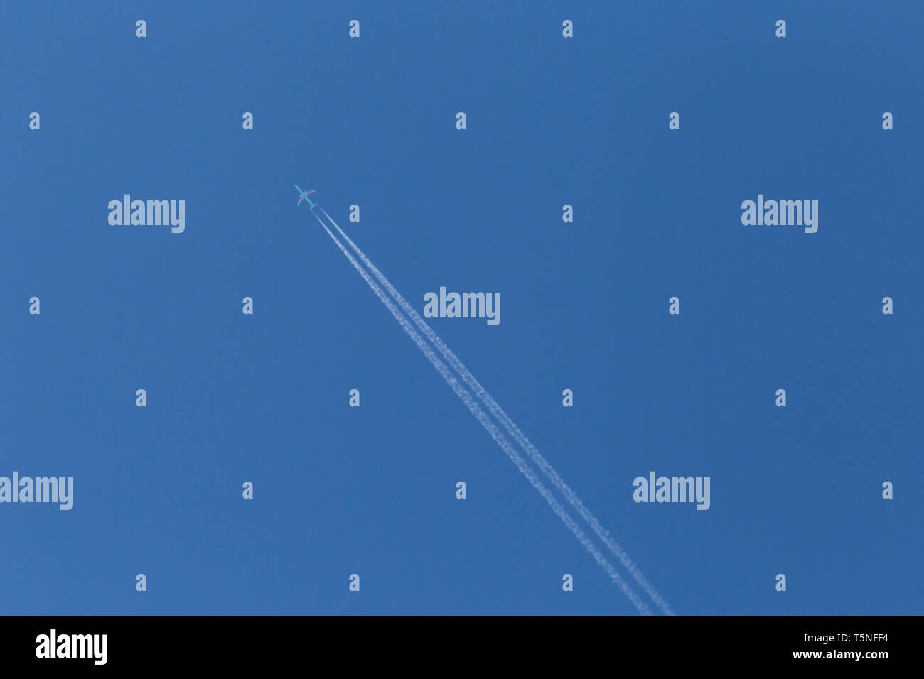 track from plane in a blue sky Stock Photo - Alamy