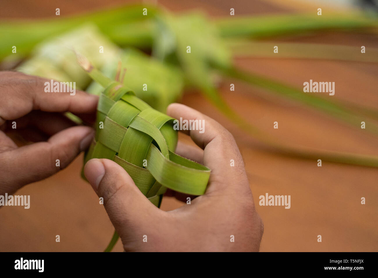 making ketupat traditional indonesian rice cake Stock Photo - Alamy
