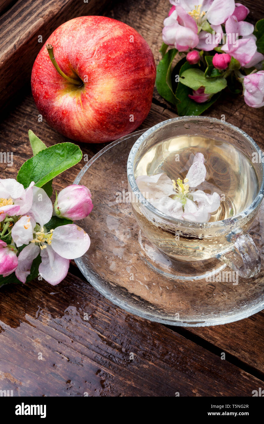Cup of fruit tea with apple flavor.Apple tea Stock Photo - Alamy