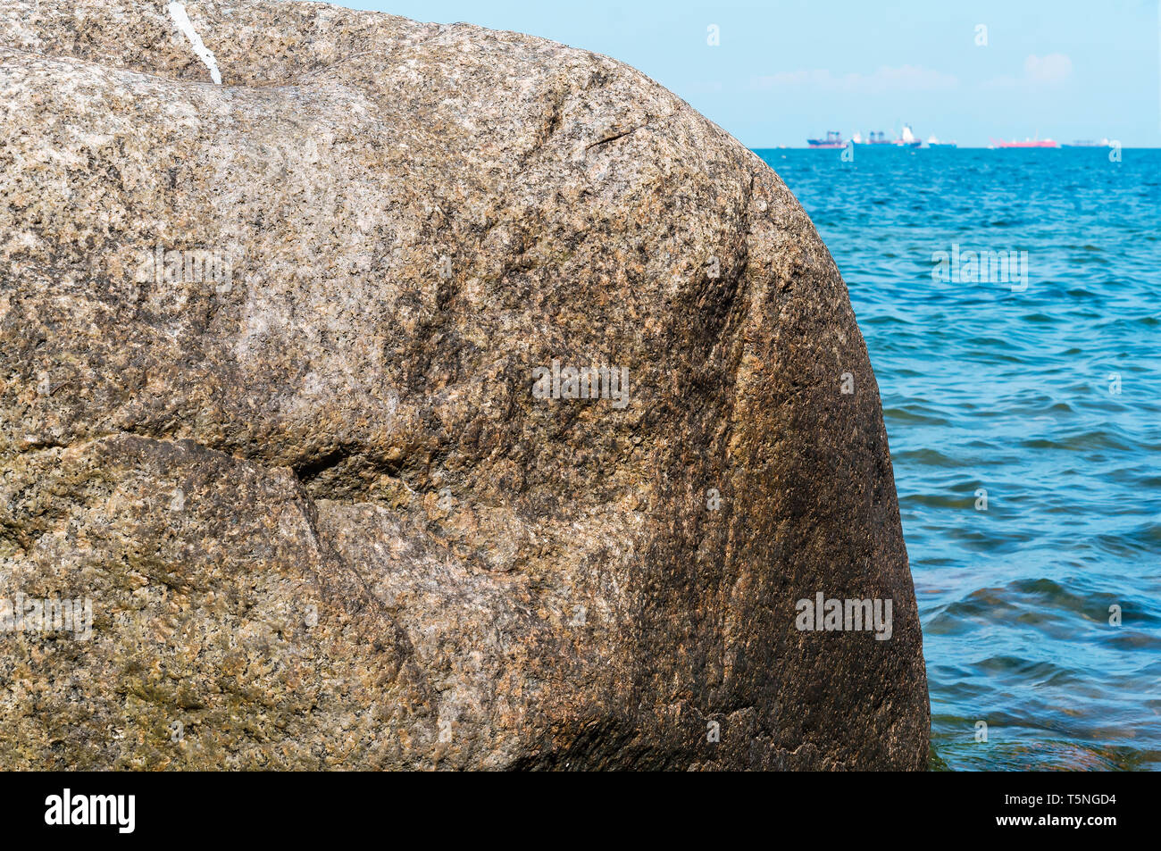 huge sea stone, boulder stone on the sea Stock Photo - Alamy