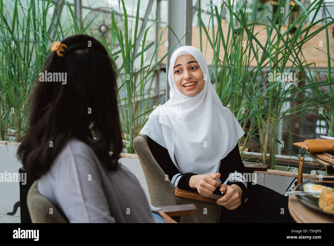 arab muslim woman in conversation Stock Photo - Alamy