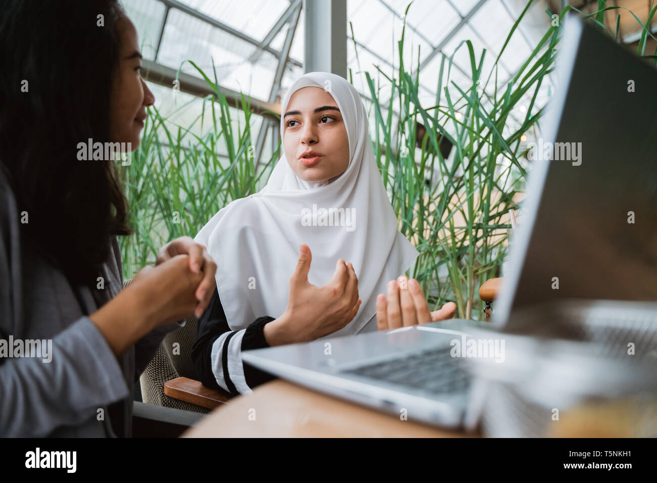 arab muslim woman in conversation Stock Photo - Alamy