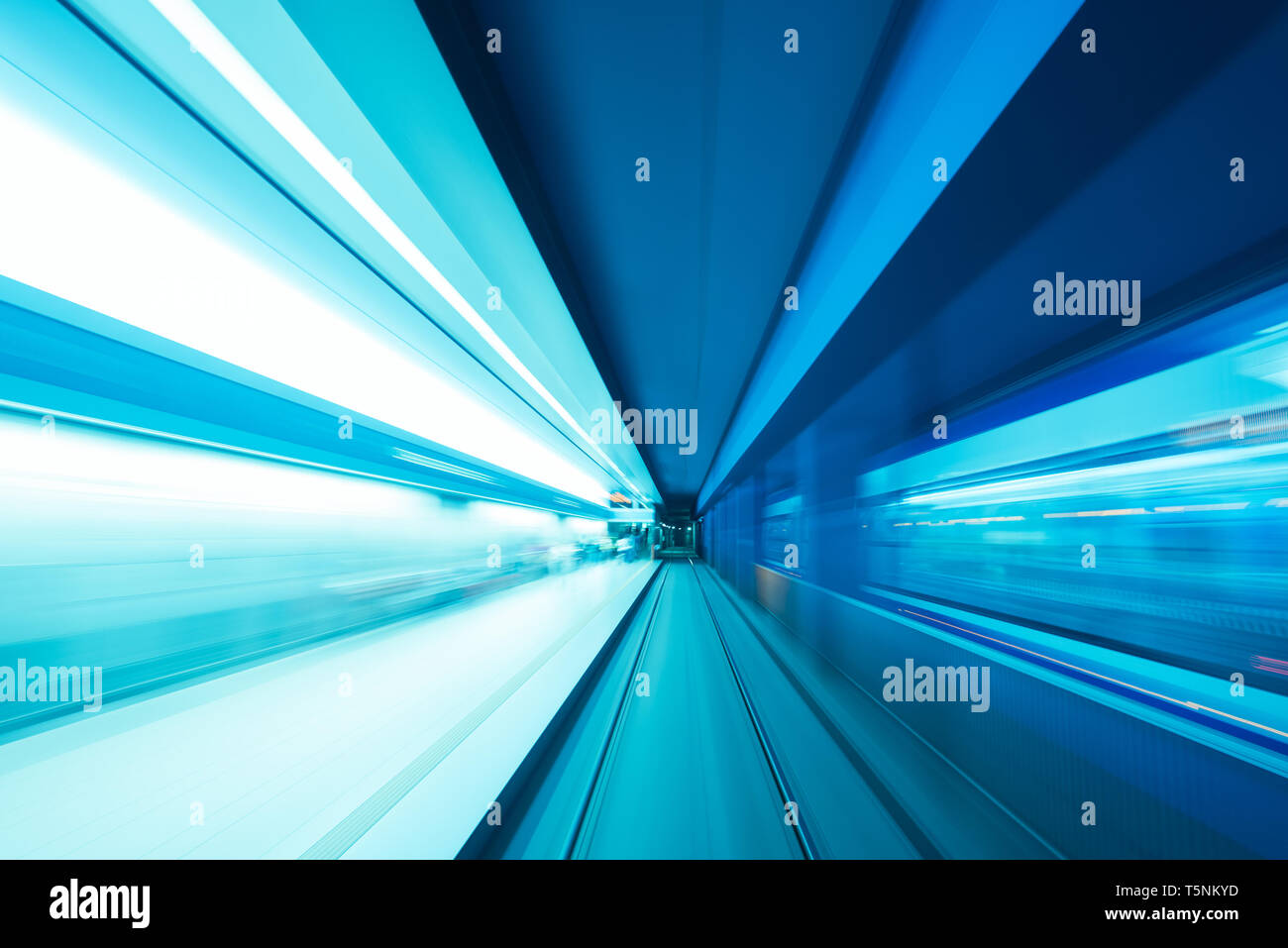 Underground subway tunnel blurred in speed motion and blue toned Stock ...