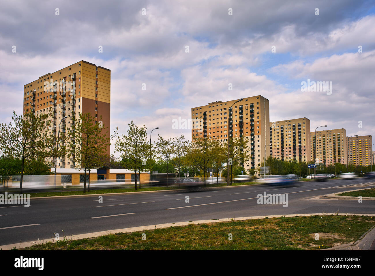 traffic and facades of a residential high-rise buildings in Poznan ...