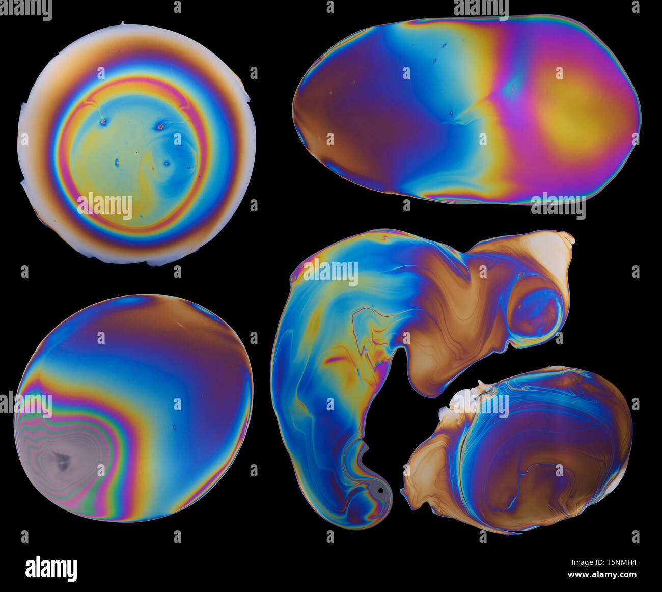 Vivid multicolored shapes created by iridescent oil spill film isolated ...