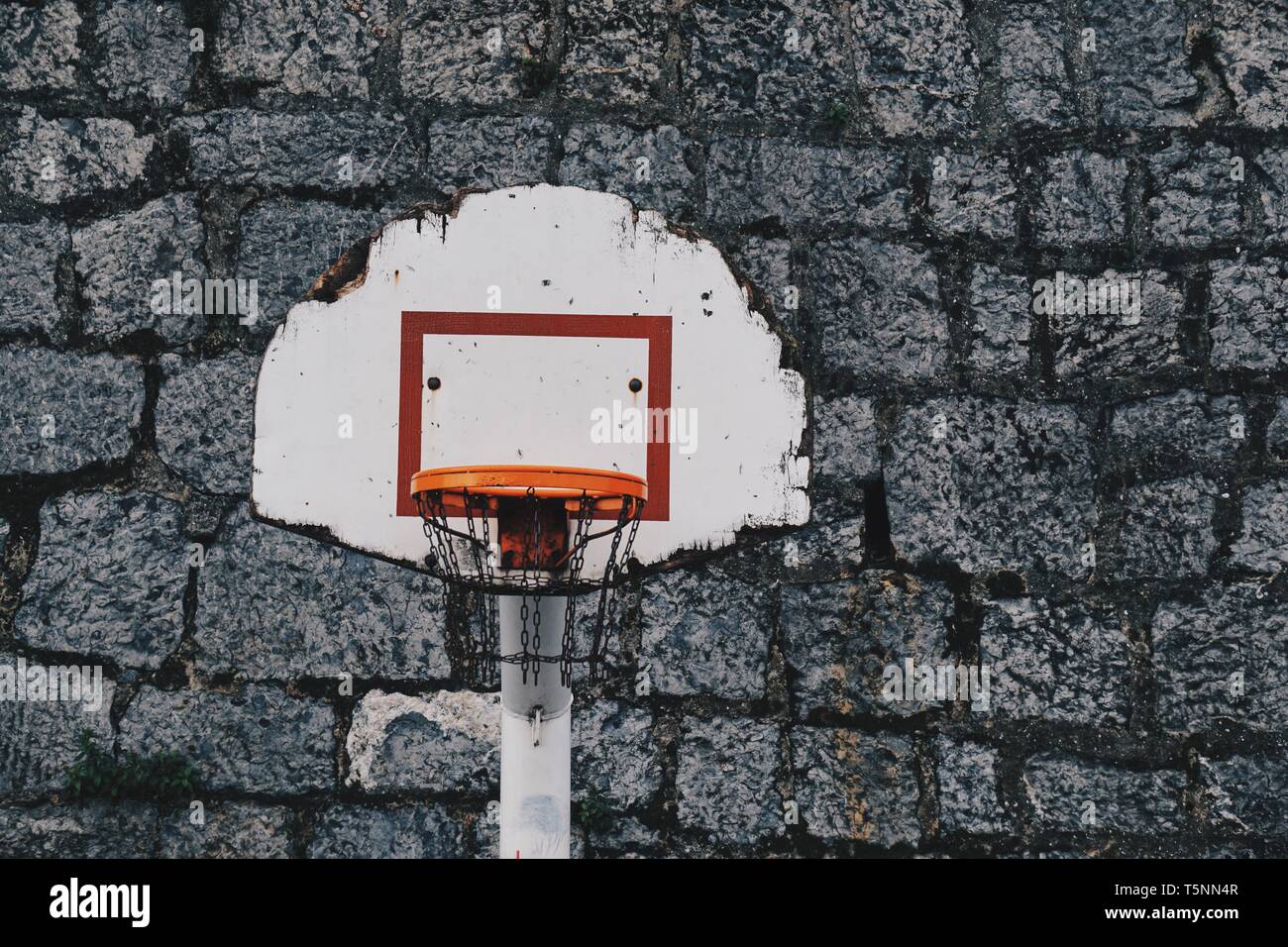 old basketball hoop in the court on the street Stock Photo - Alamy