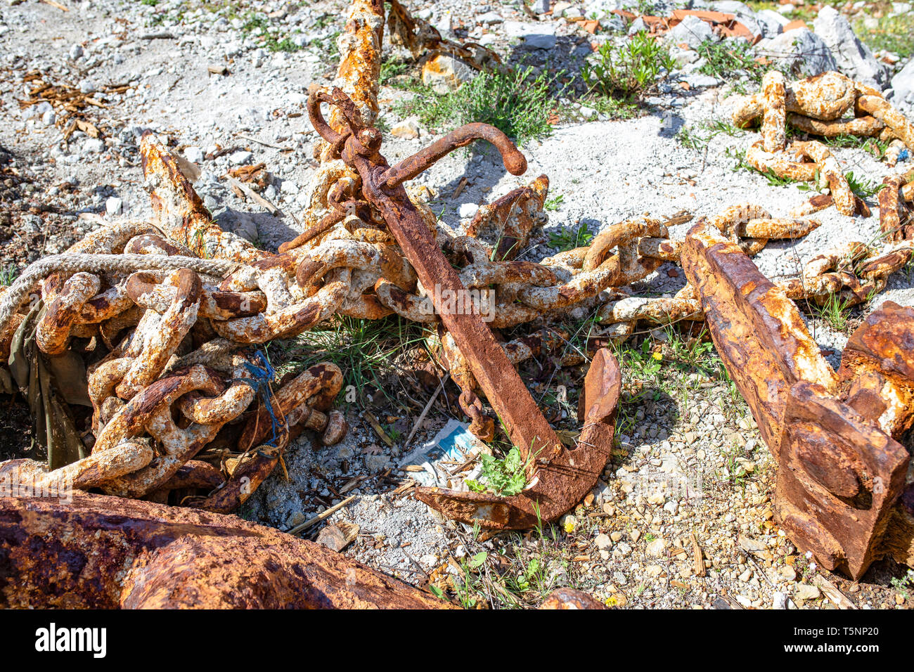 Rusty anchors and the anchor chain links in a harbor. Greece Stock ...