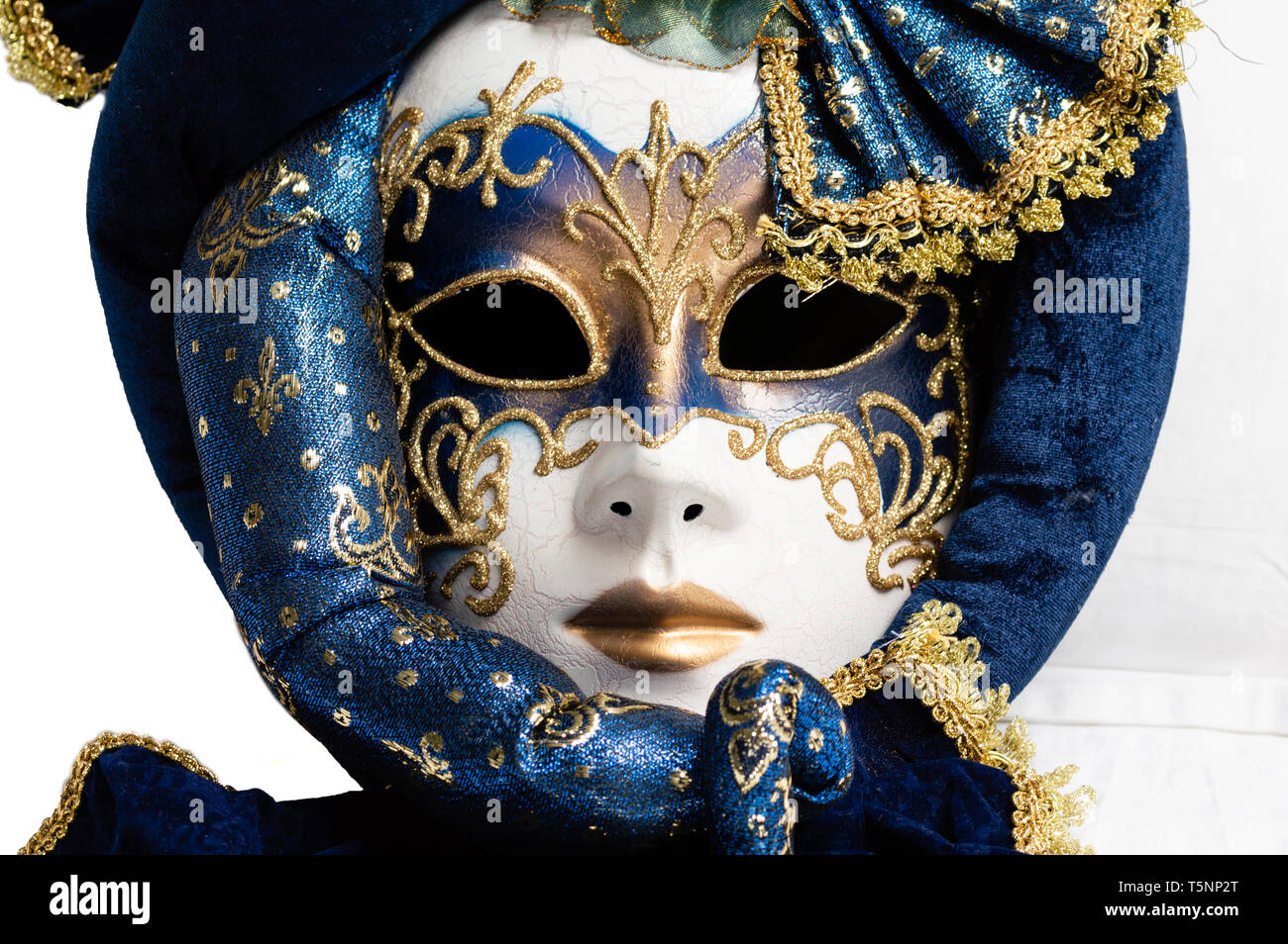 blue with gold elegant traditional venetian mask over white background ...
