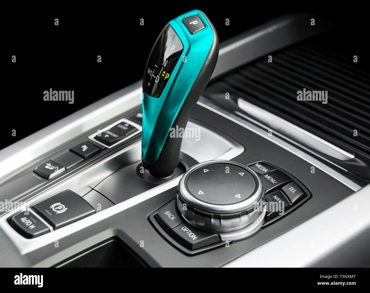 Blue Automatic gear stick of a modern car. Maodern car interior details. Close up view. Car ...