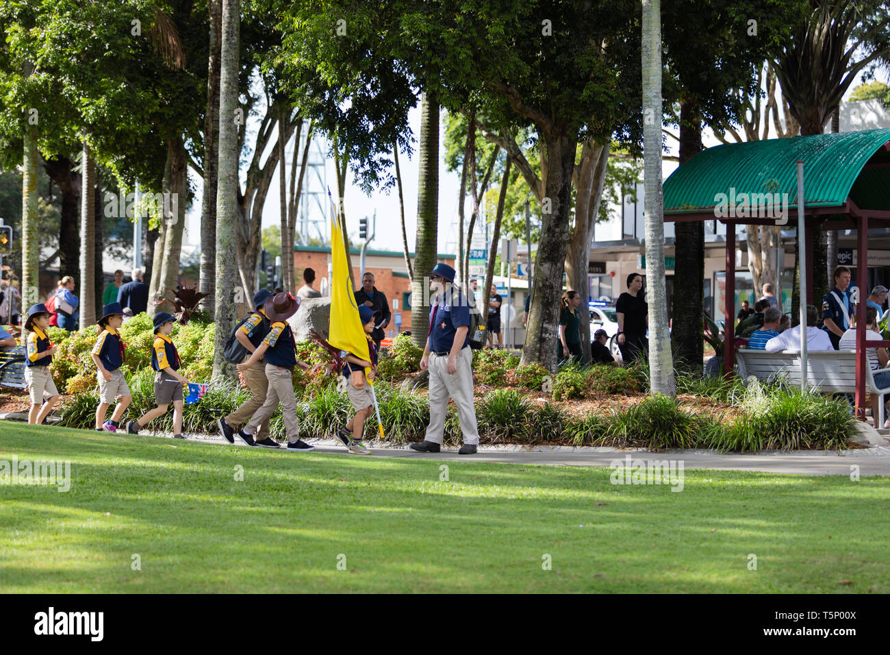 Scouts and their leader walking happily together, preparing to march ...