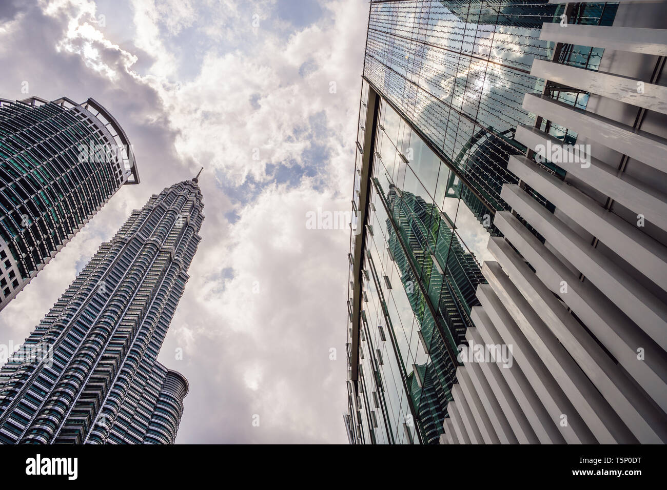 Bottom view of modern skyscrapers in business district Stock Photo - Alamy
