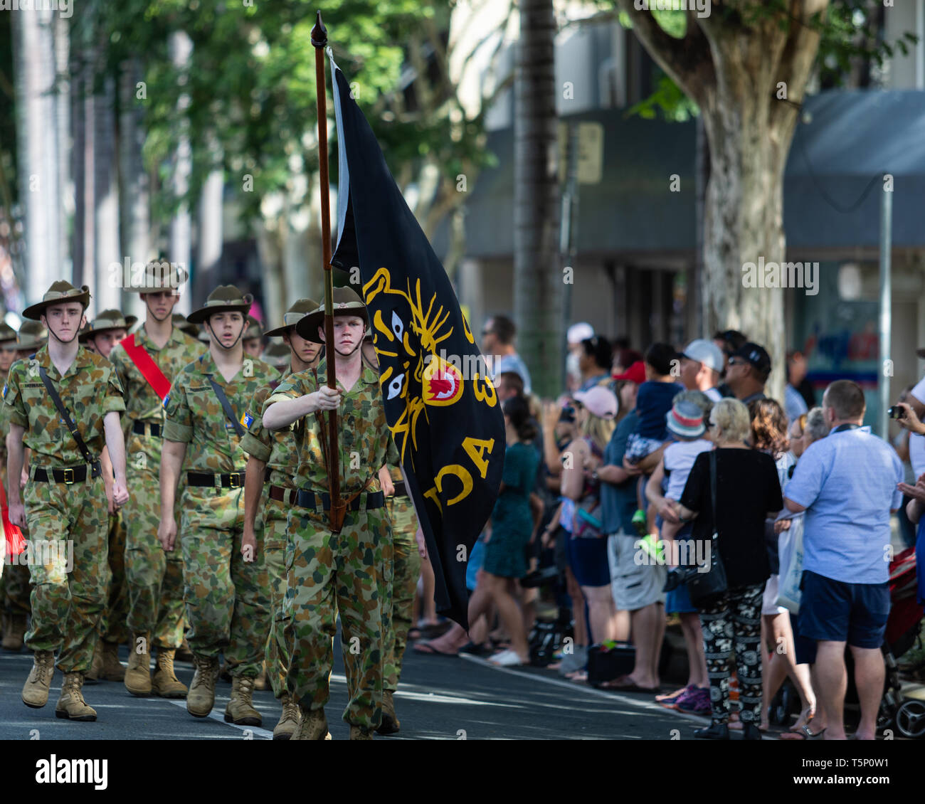 Australian Army Reserves proudly marching and bearing flags during the ...