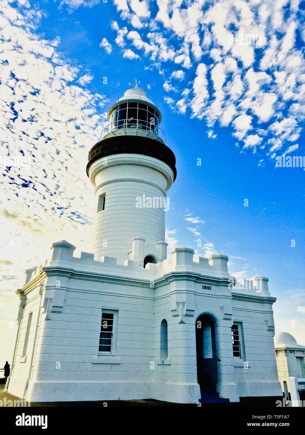 Byron Bay light house with blue sky and white clouds in the background ...