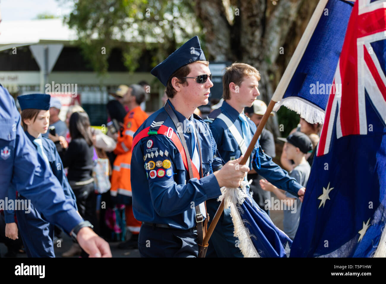 The Australian Red Cross marching together and proudly waving the ...