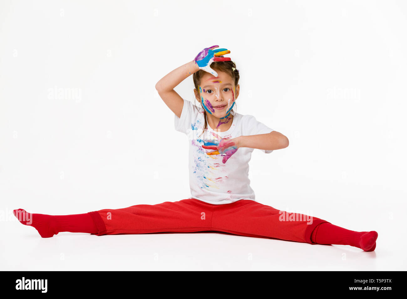 Cute little girl doing splits hi-res stock photography and images - Alamy