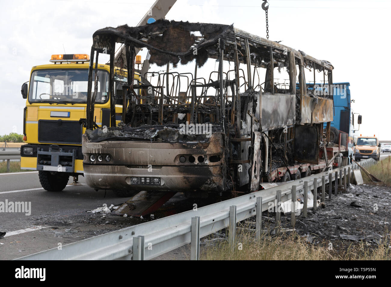 Burned Coach Bus Highway Recovery Assistance Stock Photo - Alamy