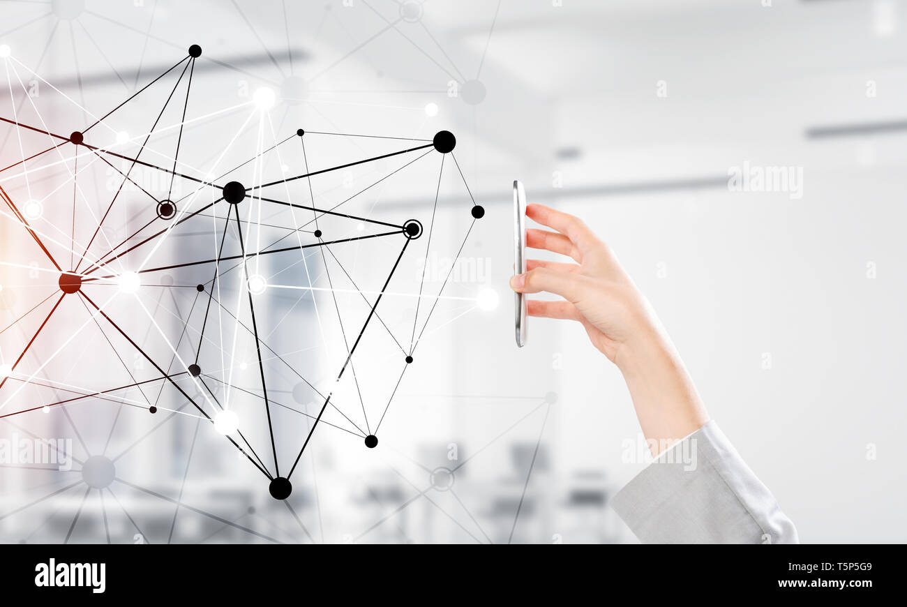 Business and technology concept with networking grid and man using ...