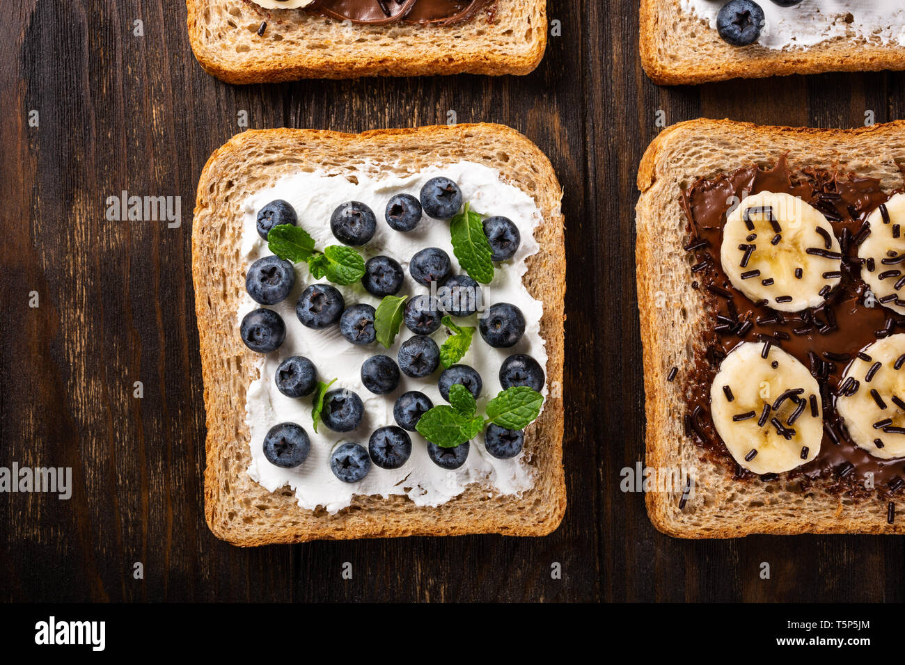 Delicious open sandwich with chocolate and banana Stock Photo - Alamy